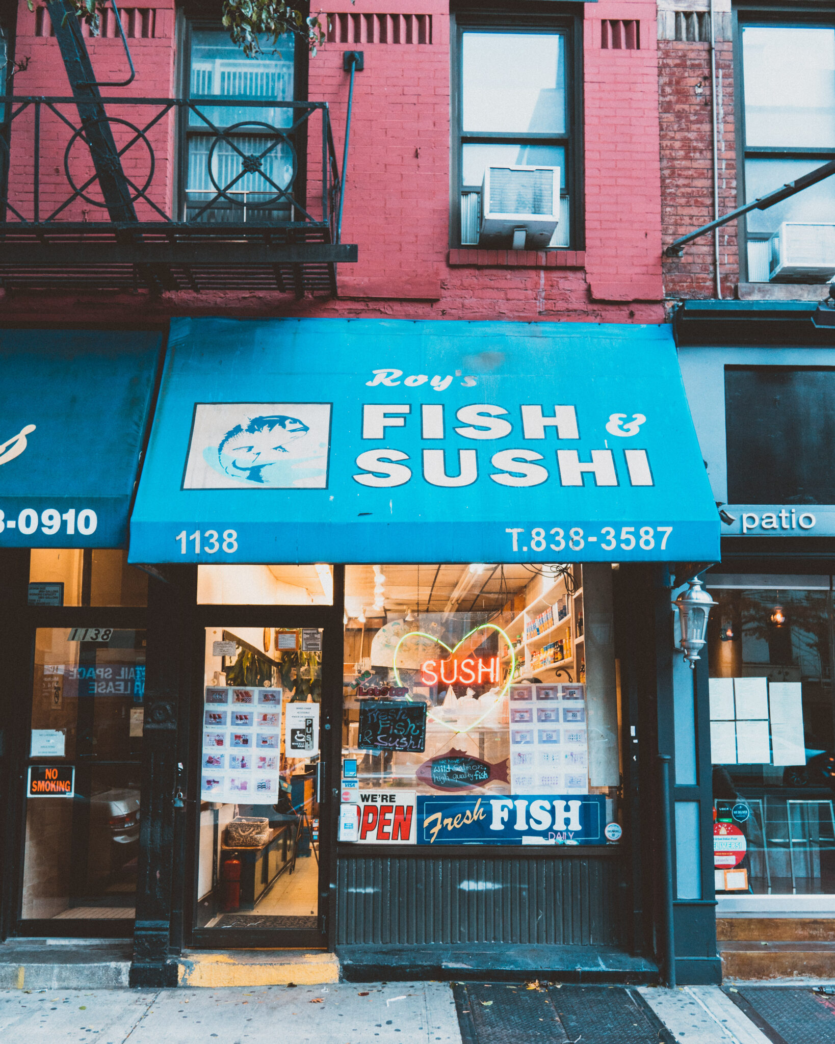 A fish market with a sushi counter | Roy's